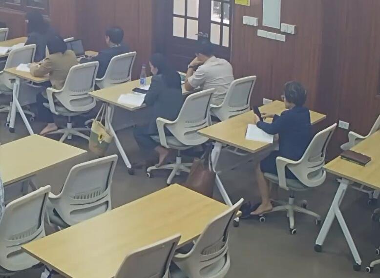 The 3xladys remove heels relax their feet at the same time!