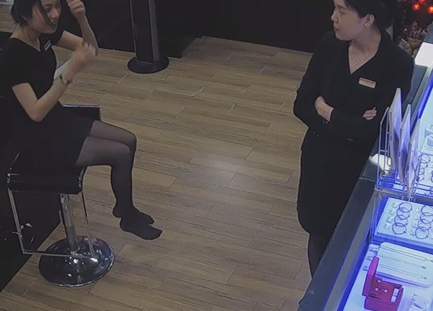 The jewelry store hostess in black nylon show us her cute feet! 257